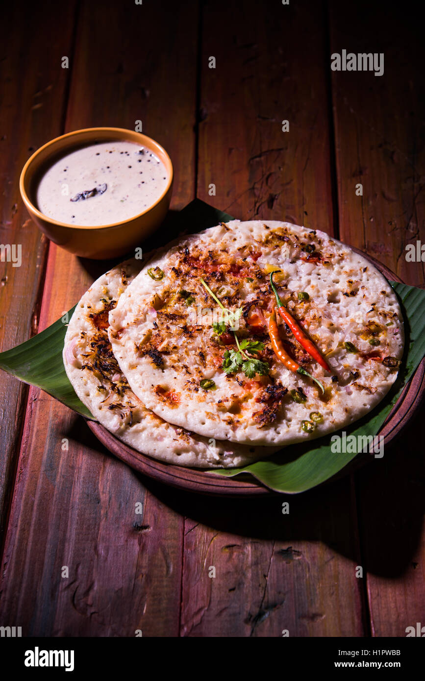 South Indian Food Uttapam or ooththappam or Uthappa is a dosa-like dish ...