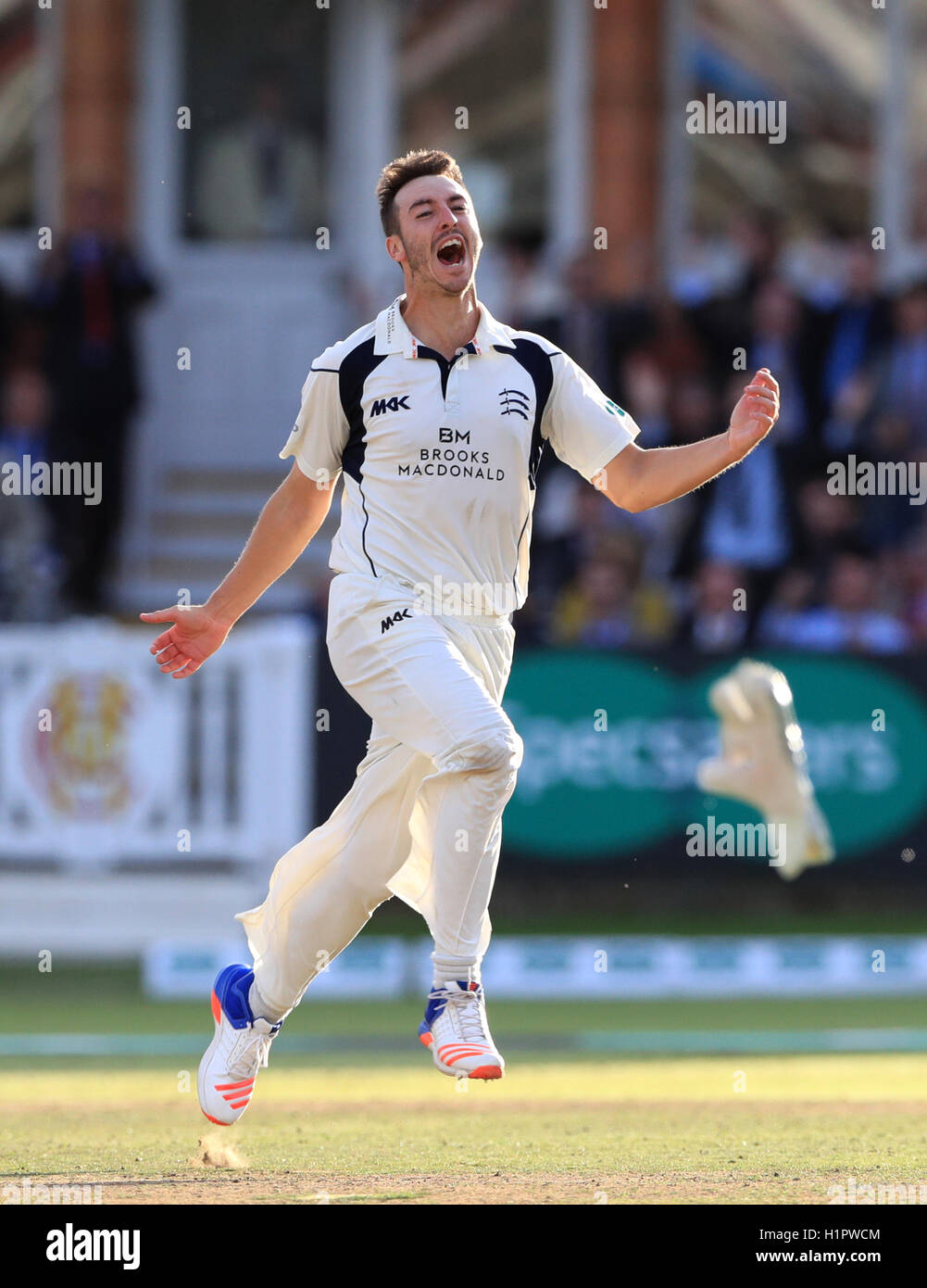 Middlsex's bowler Toby Roland-Jones celebrates taking the final wicket ...