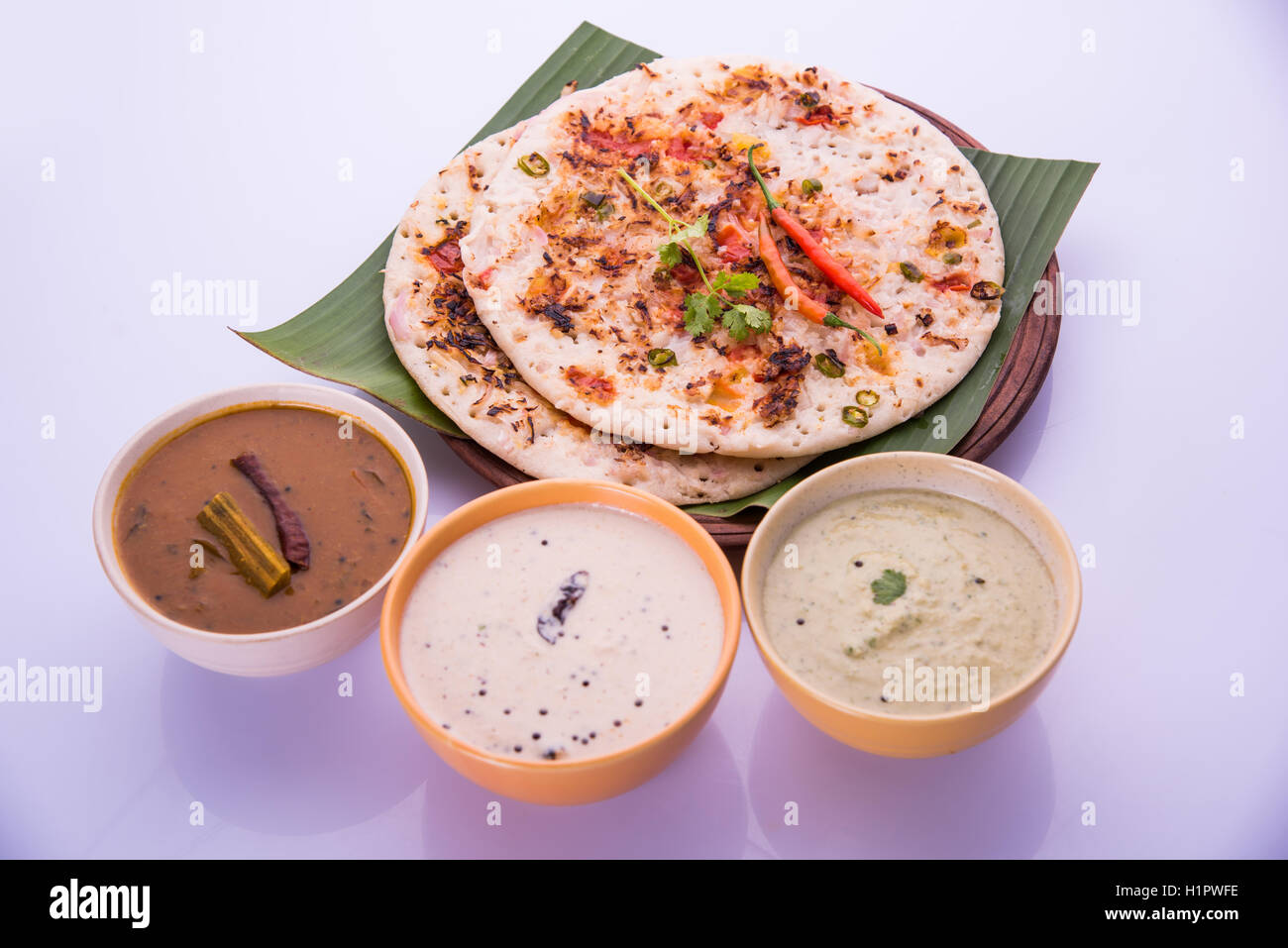 South Indian Food Uttapam or ooththappam or Uthappa is a dosa-like dish ...