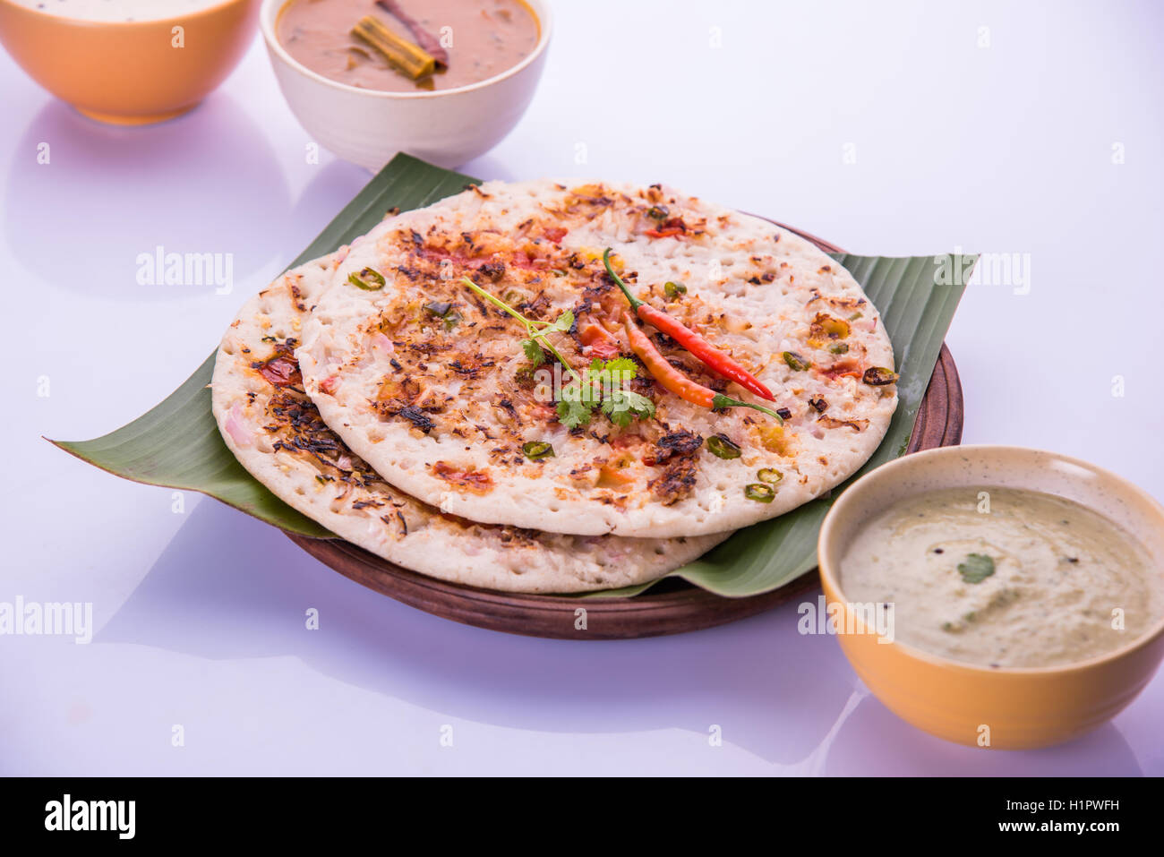 South Indian Food Uttapam or ooththappam or Uthappa is a dosa-like dish ...