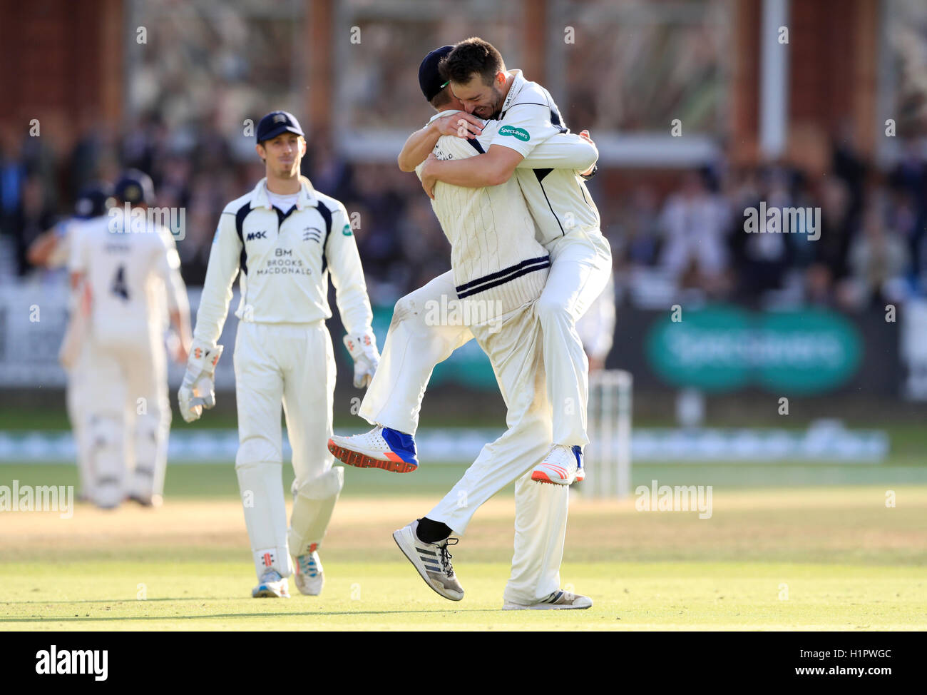 Middlesex's Toby Roland-Jones celebrates after taking the wicket of ...
