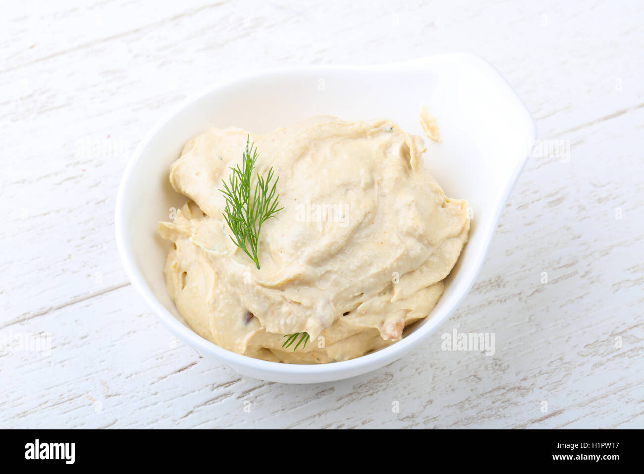 Arabic traditional cuisine - hummus with herbs and spices Stock Photo ...