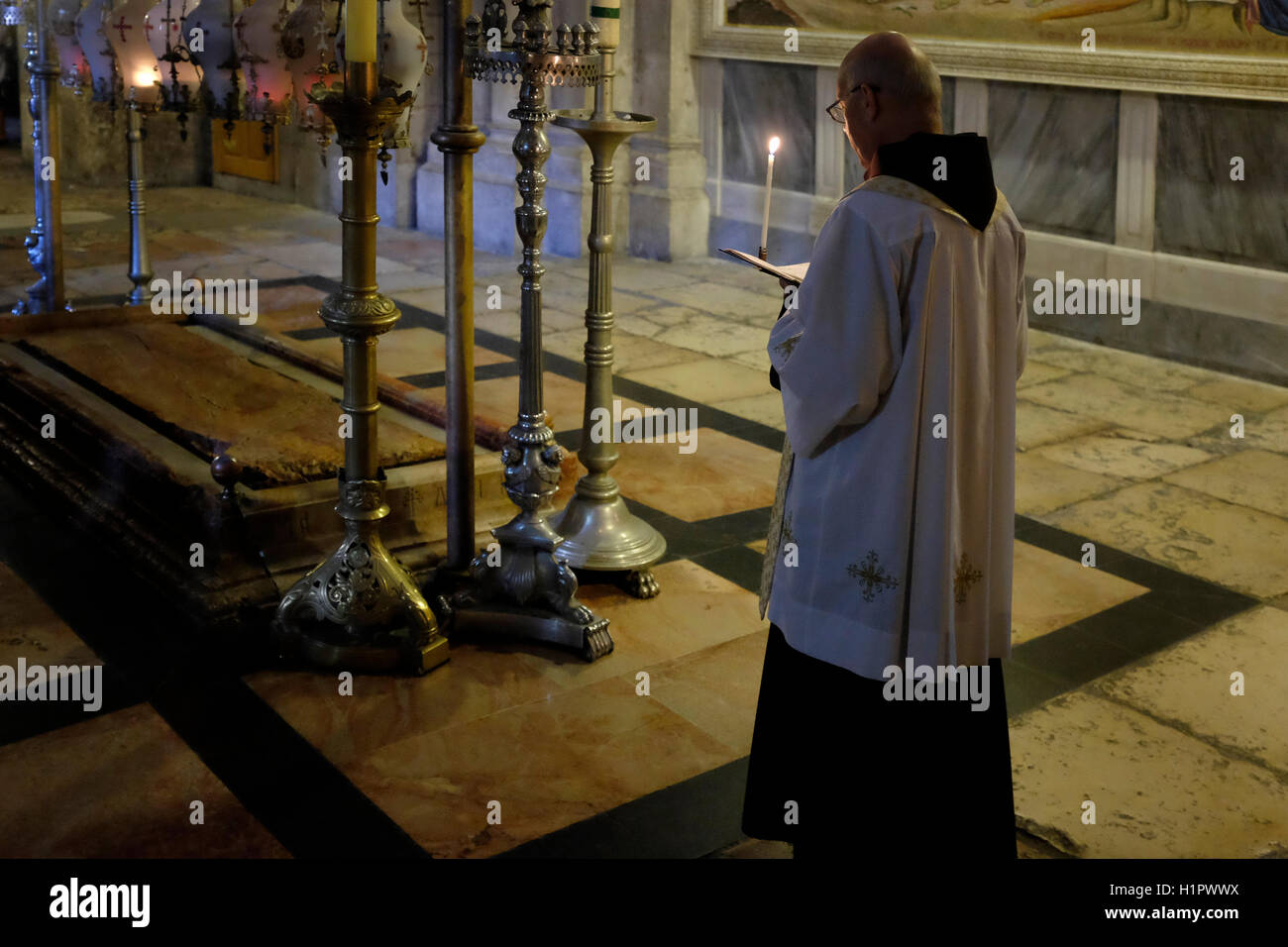 A Latin priest taking part in a Roman Catholic mass procession at the ...