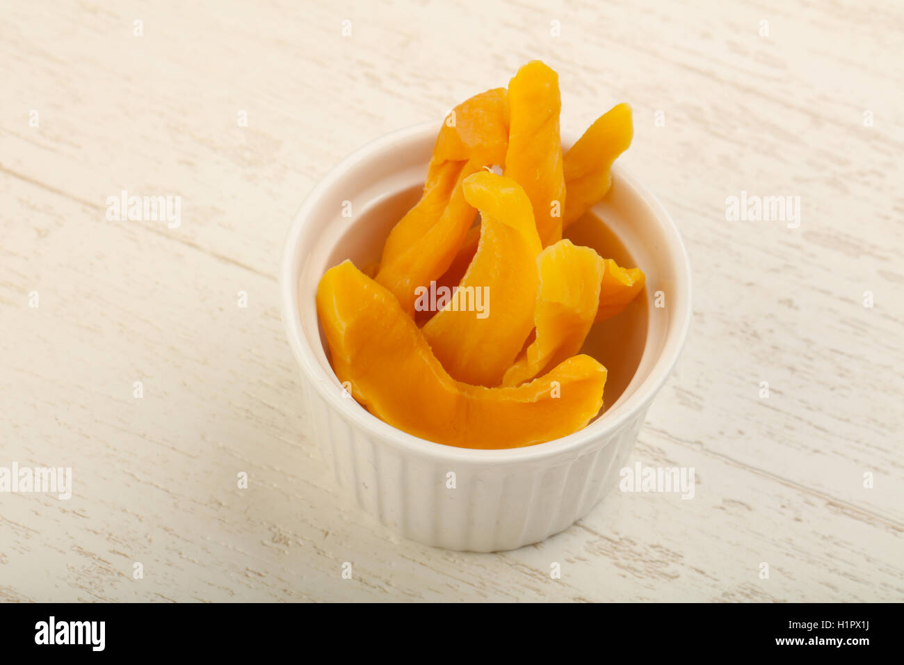 Dehydrated dried mango chips hi-res stock photography and images - Alamy