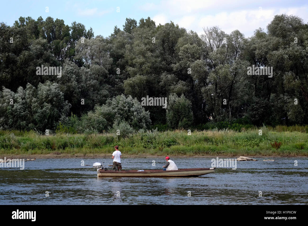 Angler fishermen at the shore of the Vistula river the longest and ...