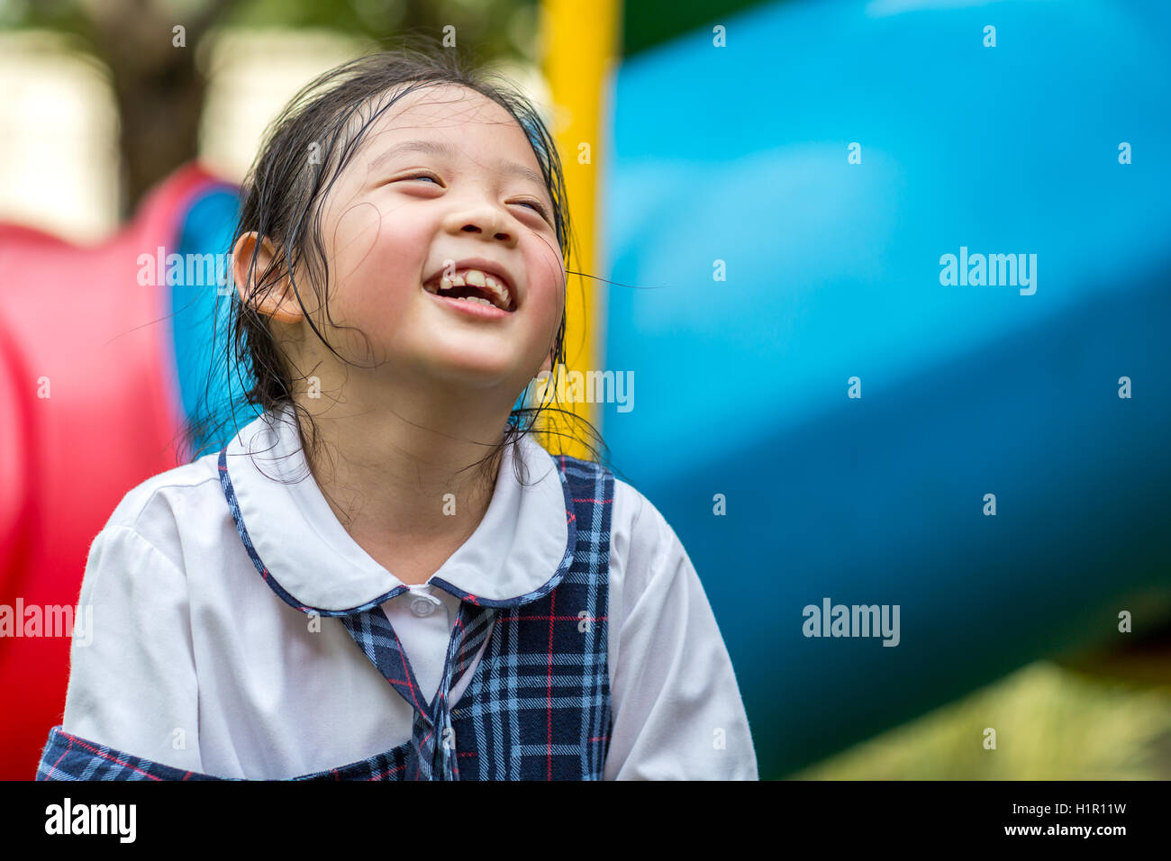 Face expression of super happy child while playing Stock Photo - Alamy