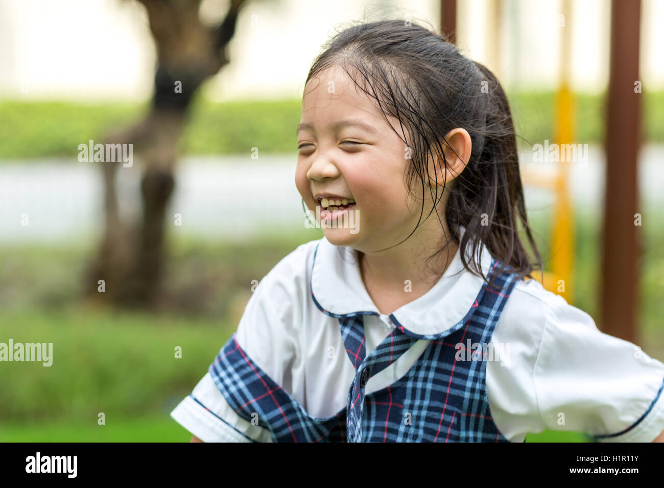 Face expression of kid laughing with happiness Stock Photo - Alamy