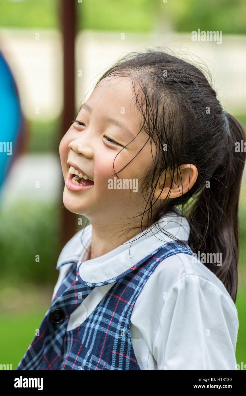 Face expression of super happy kid while playing Stock Photo - Alamy