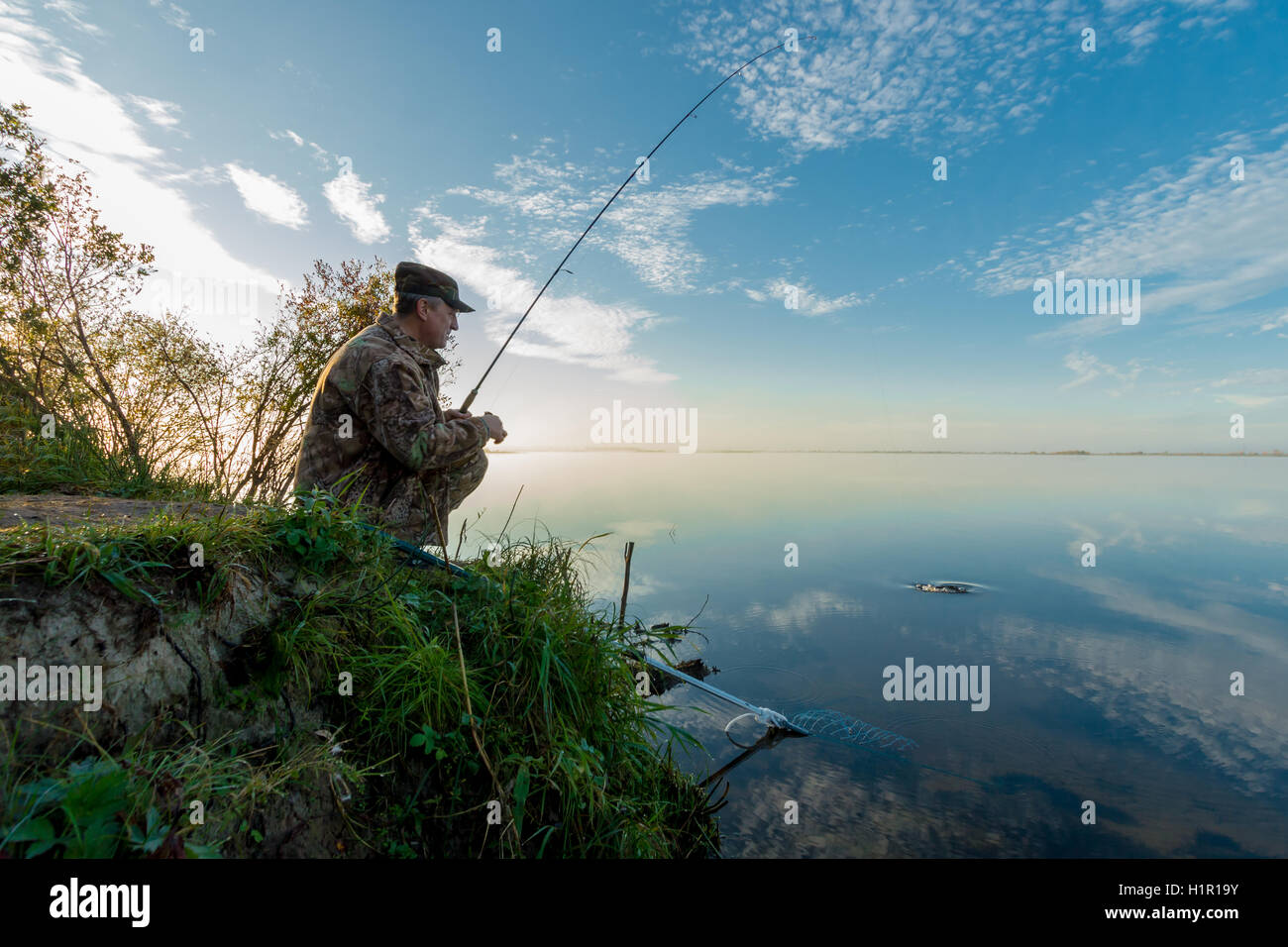In the morning fishing Stock Photo - Alamy