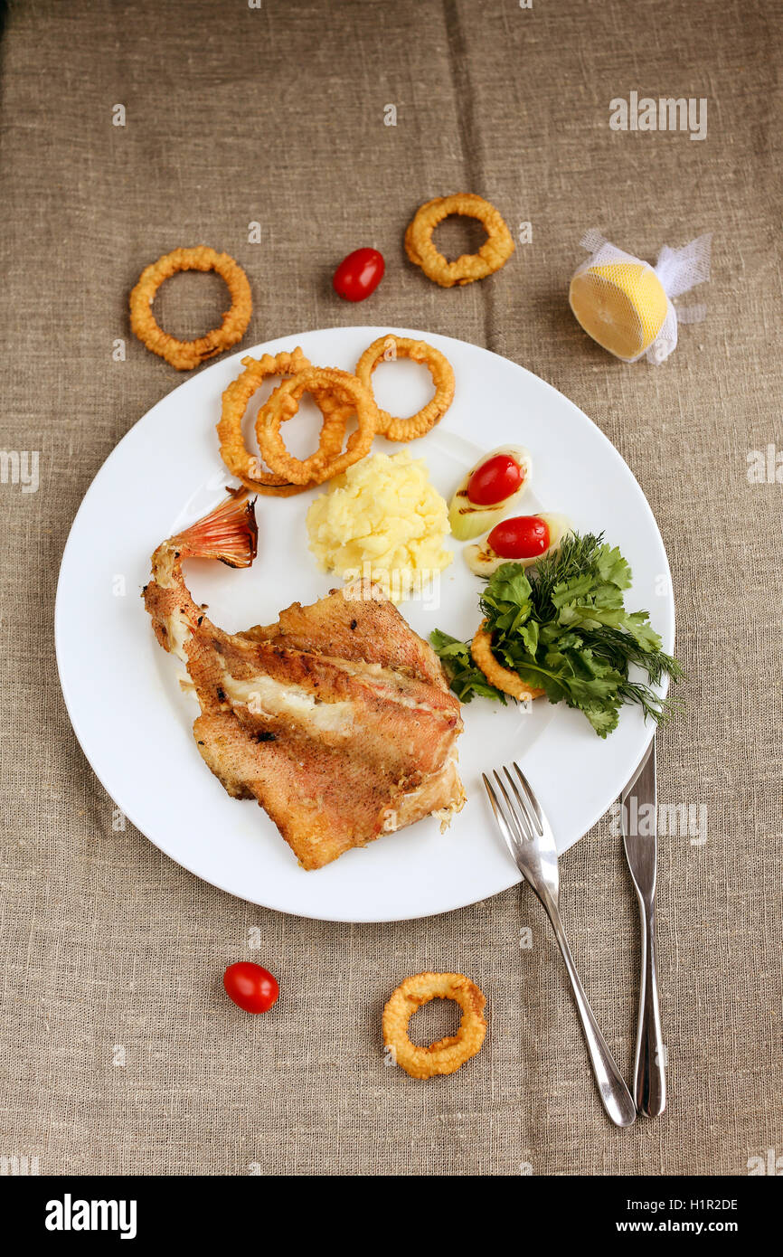 Fish with onion hi-res stock photography and images - Alamy