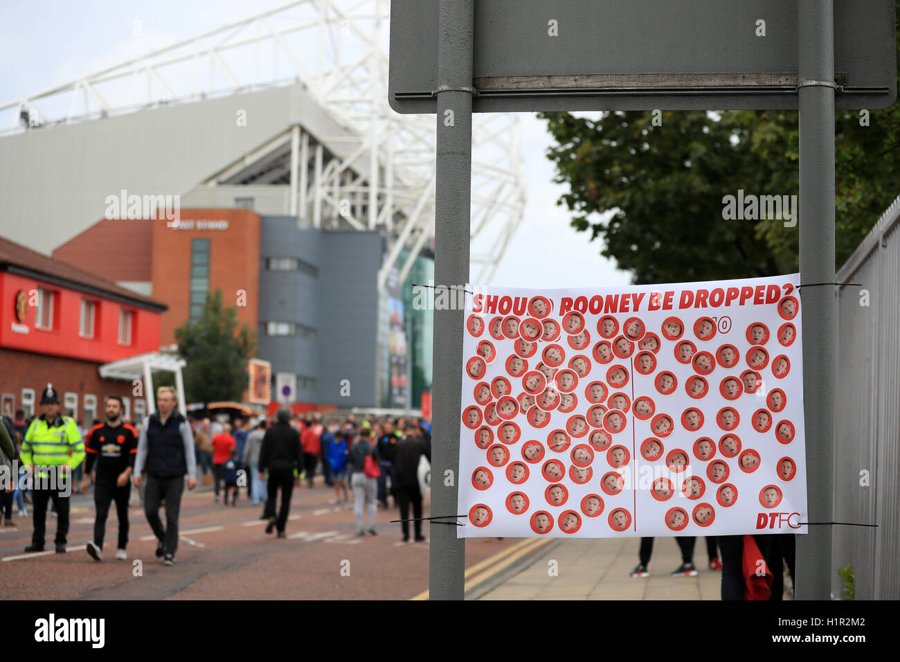 A sign outside Old Trafford asking fans to put stickers on to vote if ...