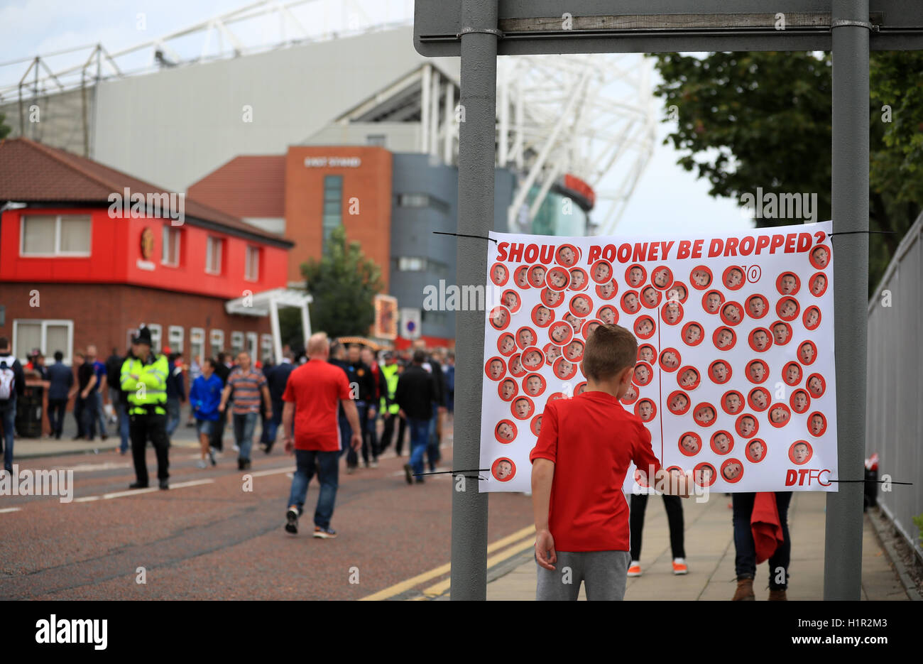 A sign outside Old Trafford asking fans to put stickers on to vote if ...