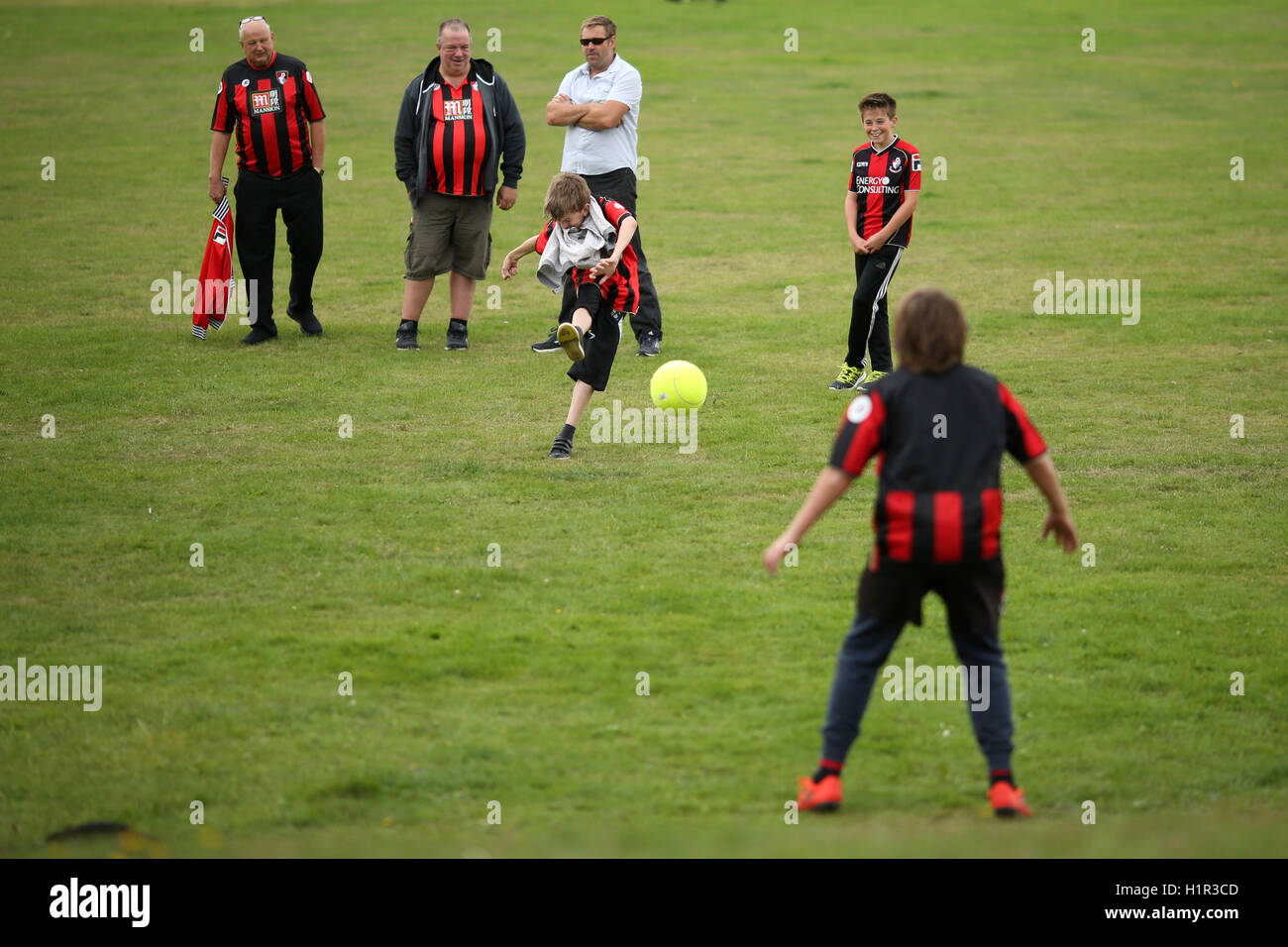 AFC Bournemouth fans play football before the Premier League match at ...