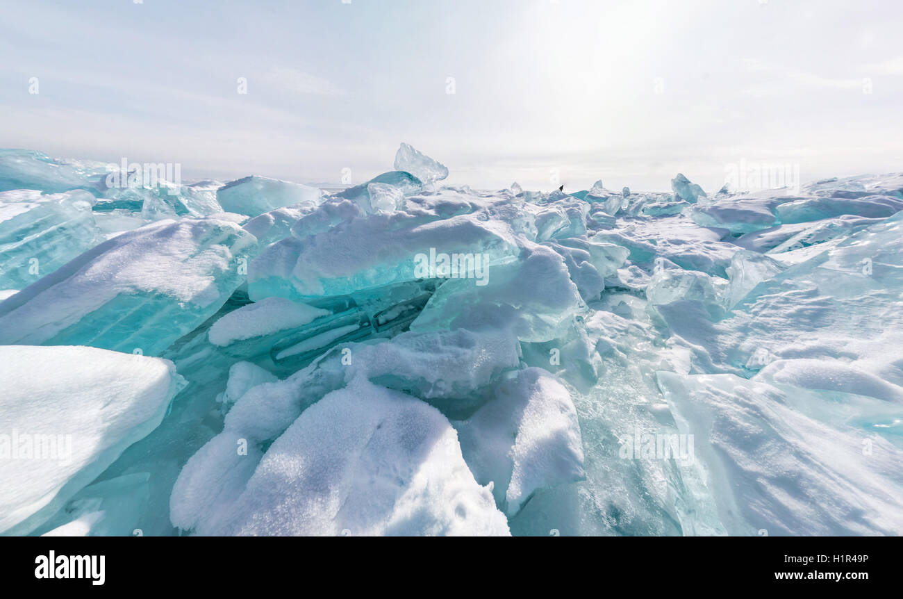 blue hummocks of of lake baikal ice in a stretched widescreen format ...