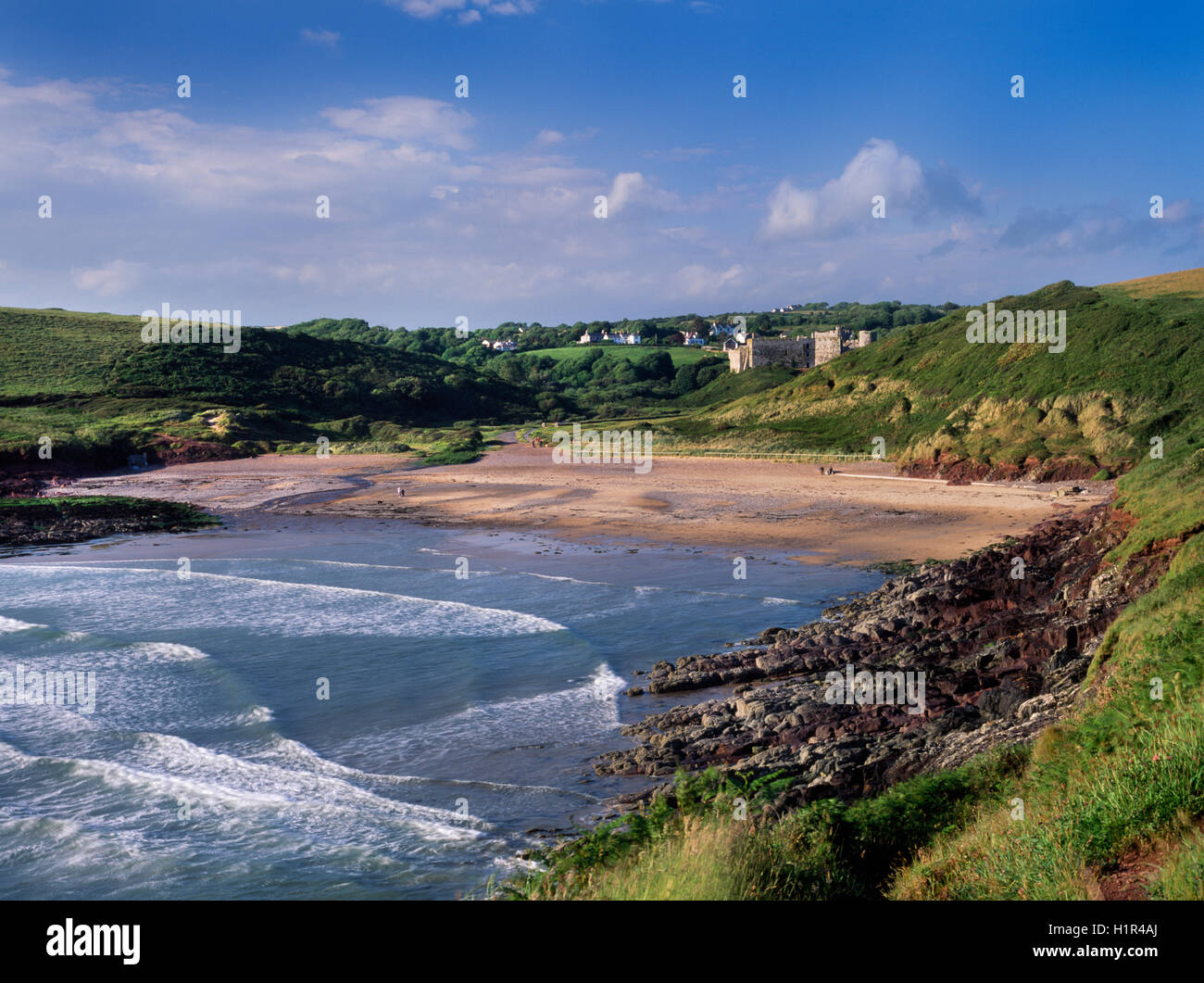Manorbier beach and Norman castle seen from the Pembrokeshire Coast ...