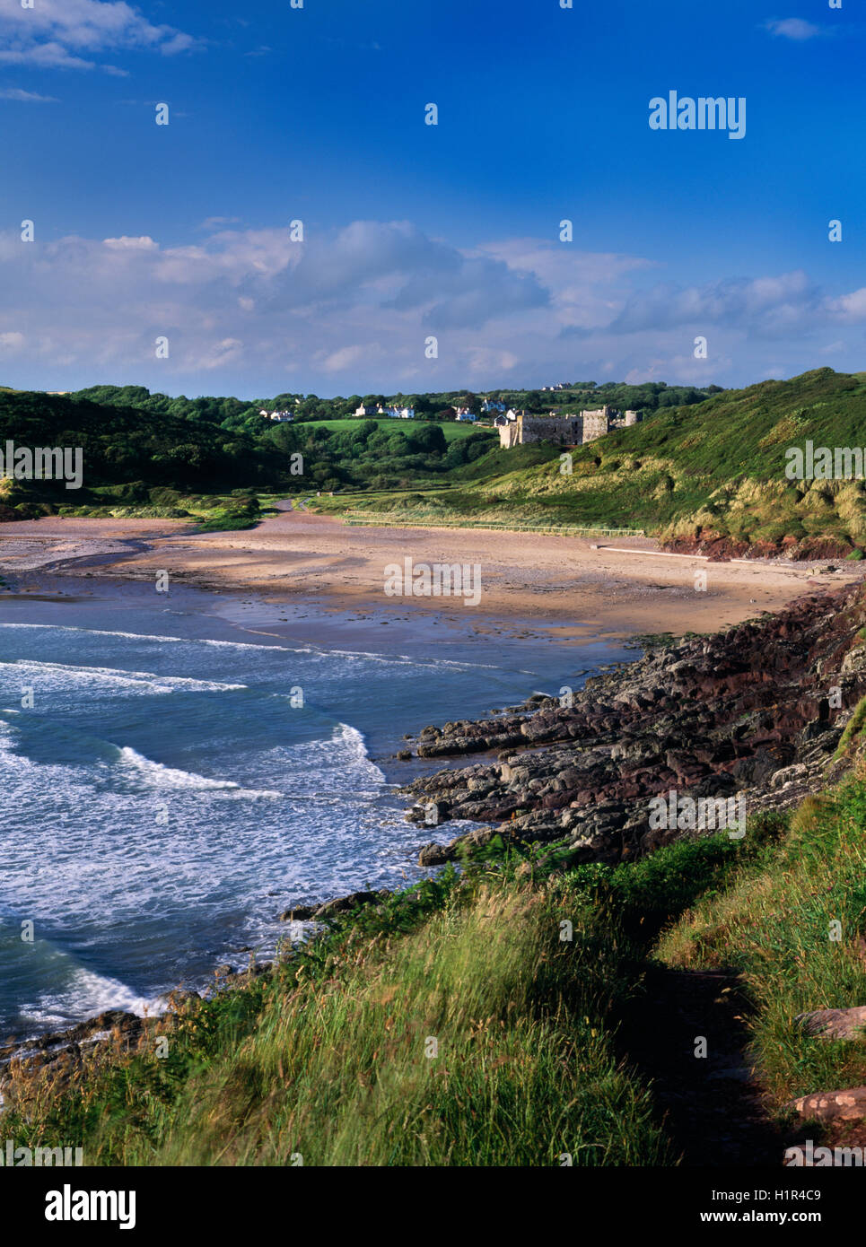 Manorbier beach and Norman castle seen from the Pembrokeshire Coast ...