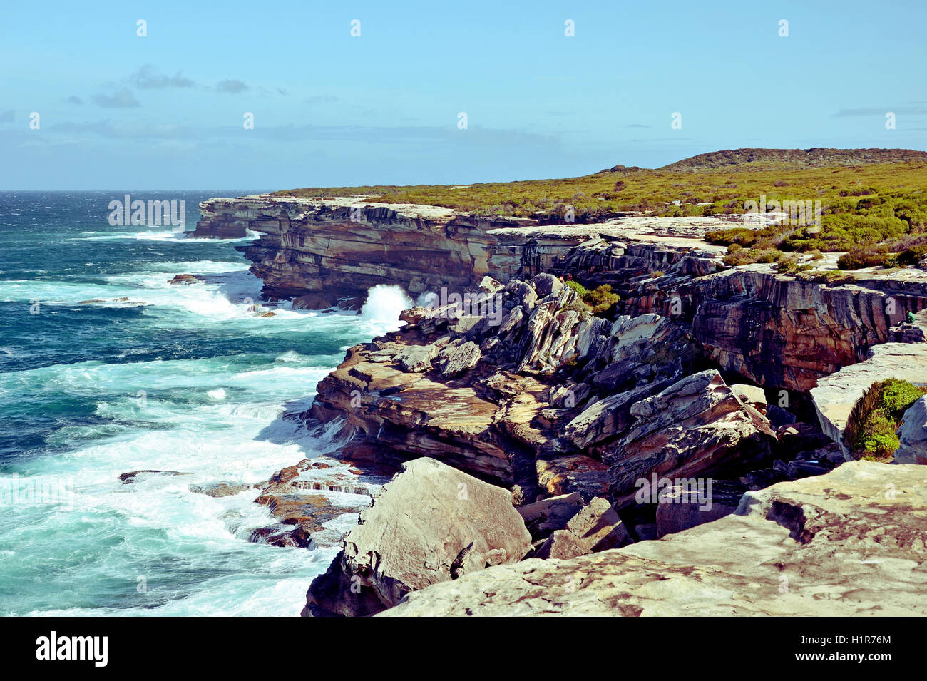 Weathered, rugged sandstone cliffs of Cape Solander, New South Wales ...