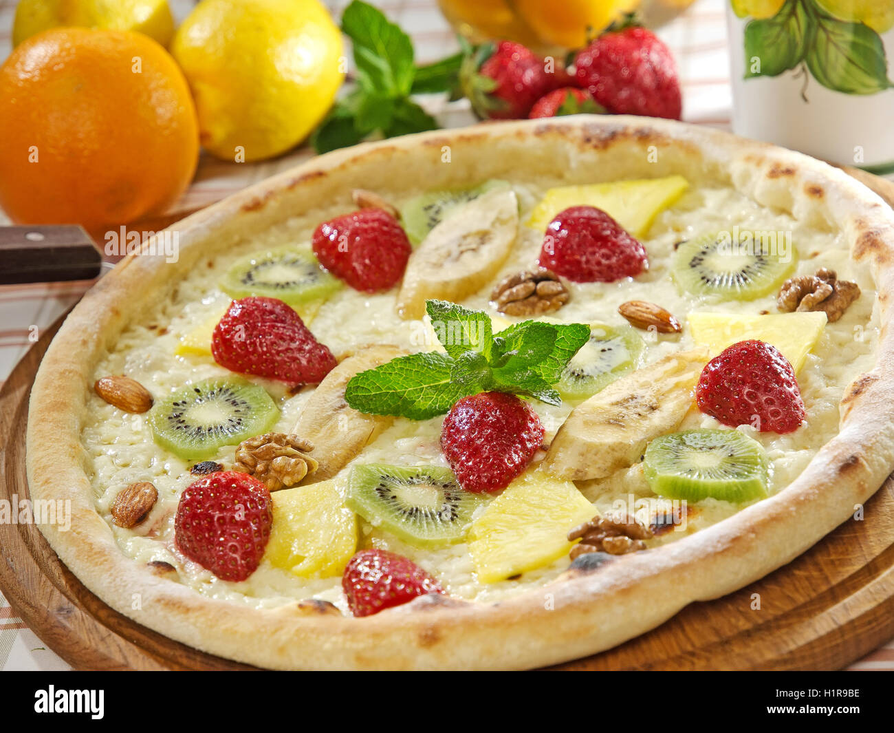 Sweet pizza with strawberry and banana Stock Photo - Alamy