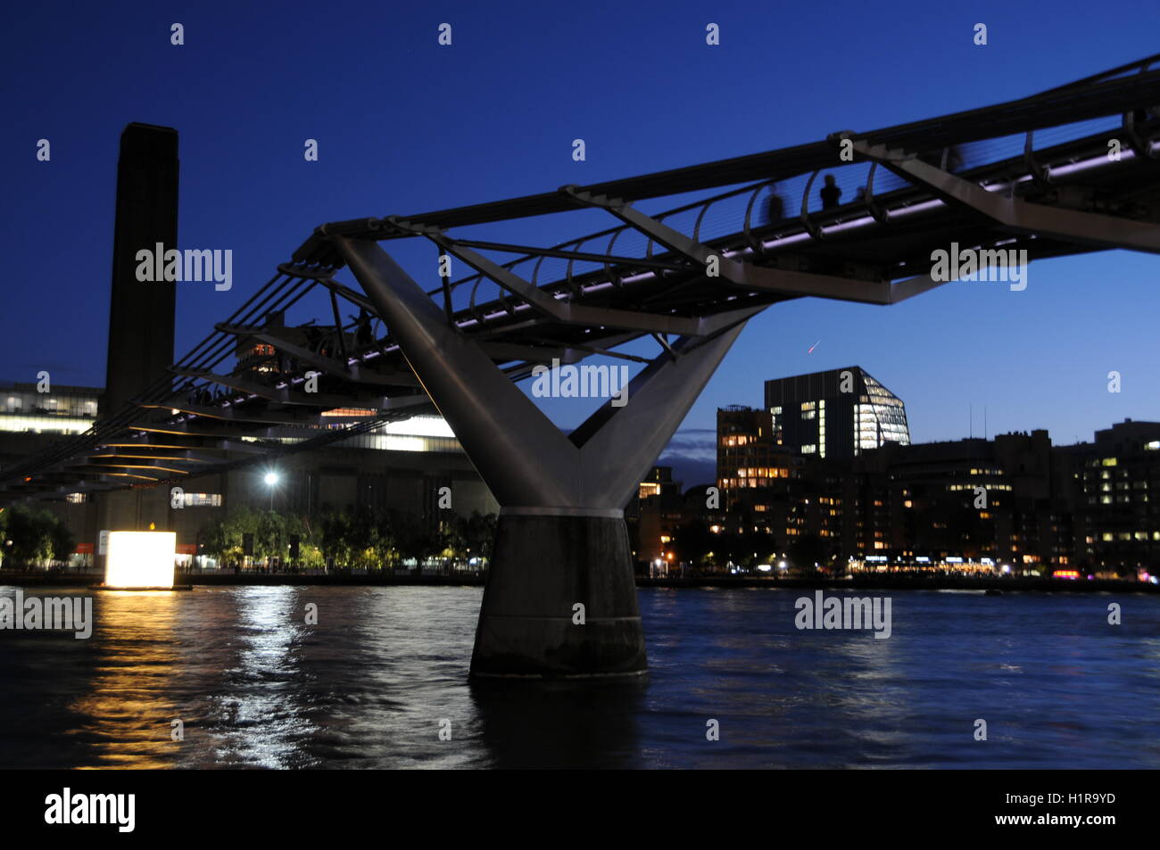 A horizontal image of London's Millennium Bridge, at night Stock Photo ...