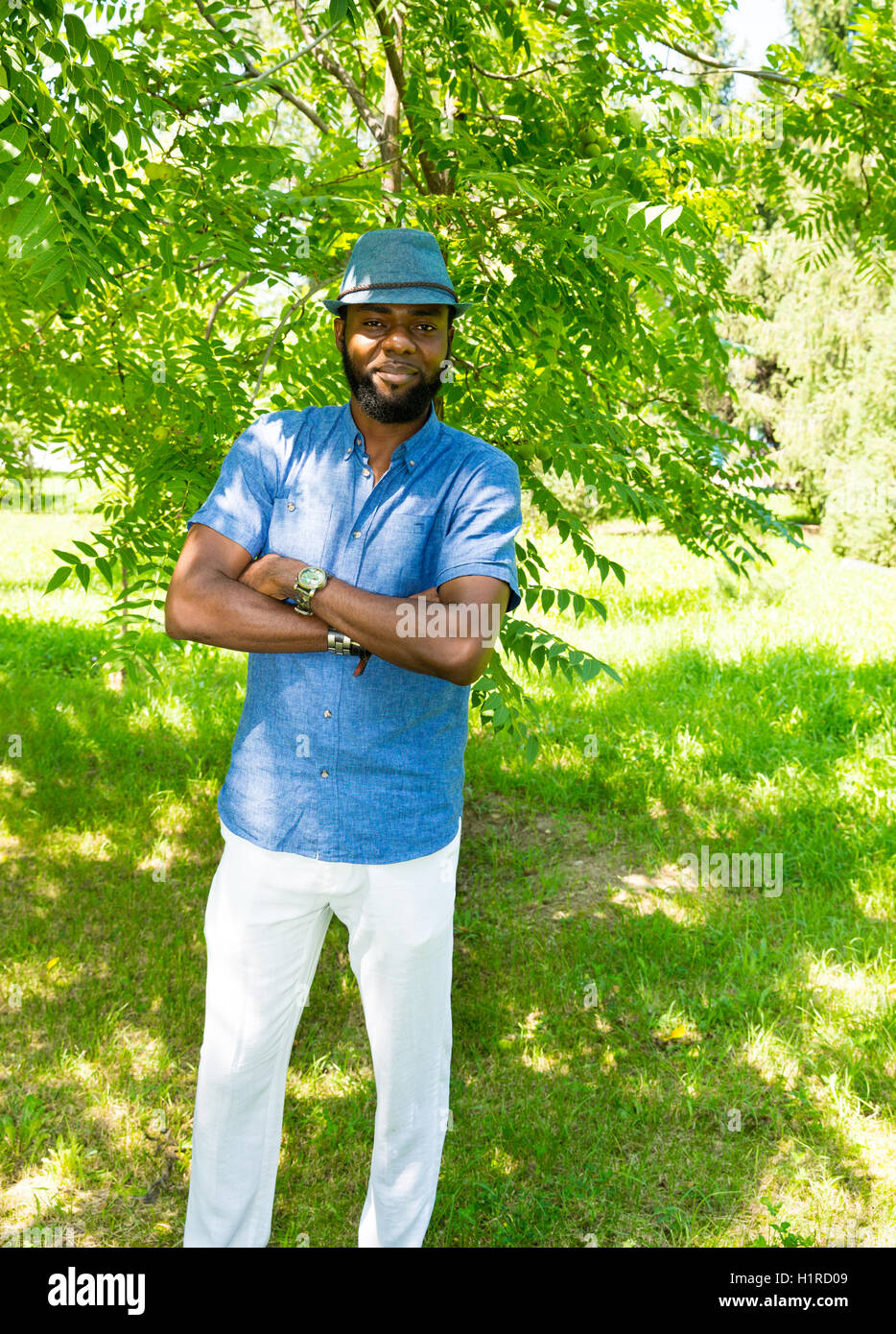 Portrait of African American Cheerful black man smiling on nature Stock ...