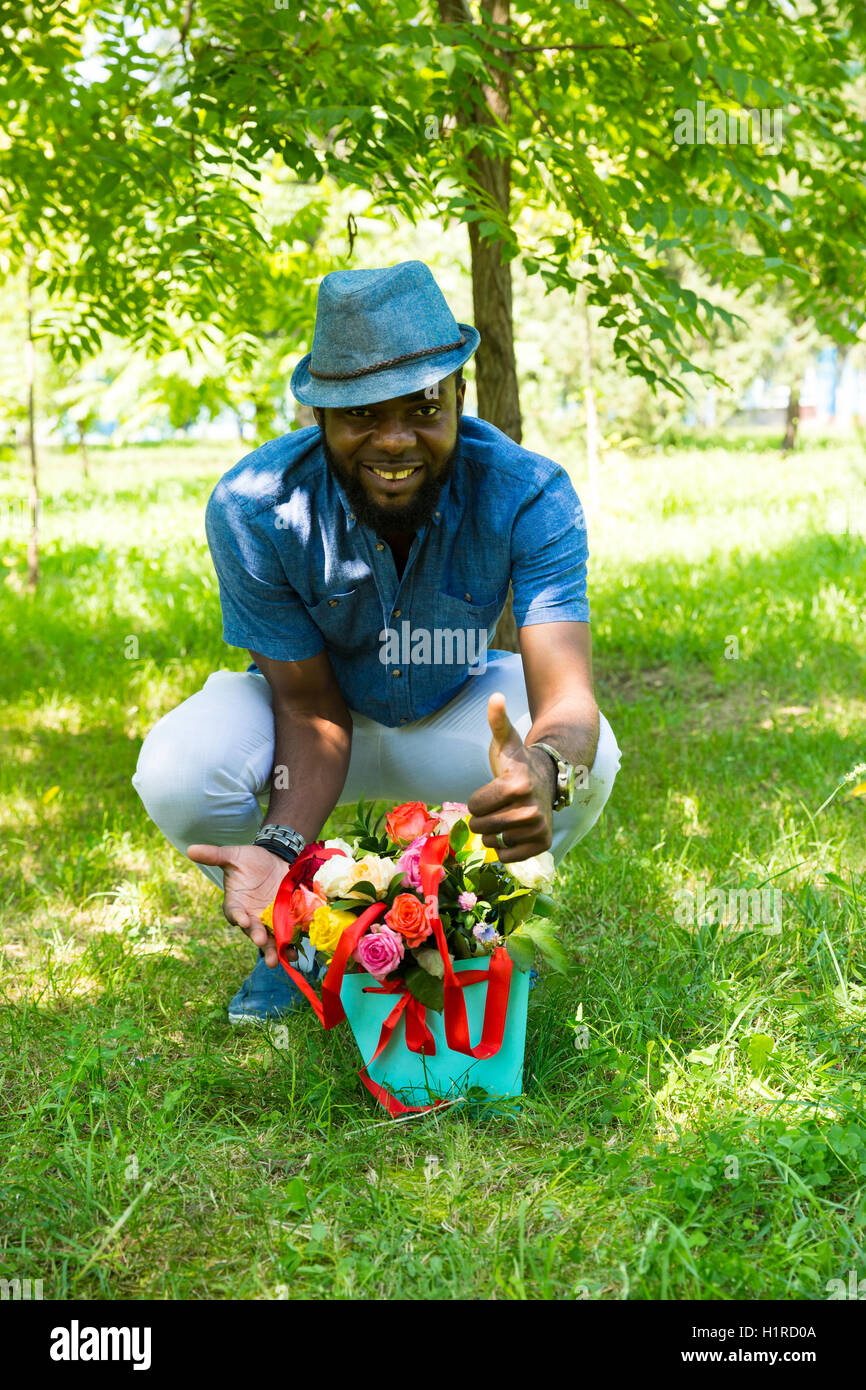 Portrait of African American Cheerful black man smiling on nature Stock ...