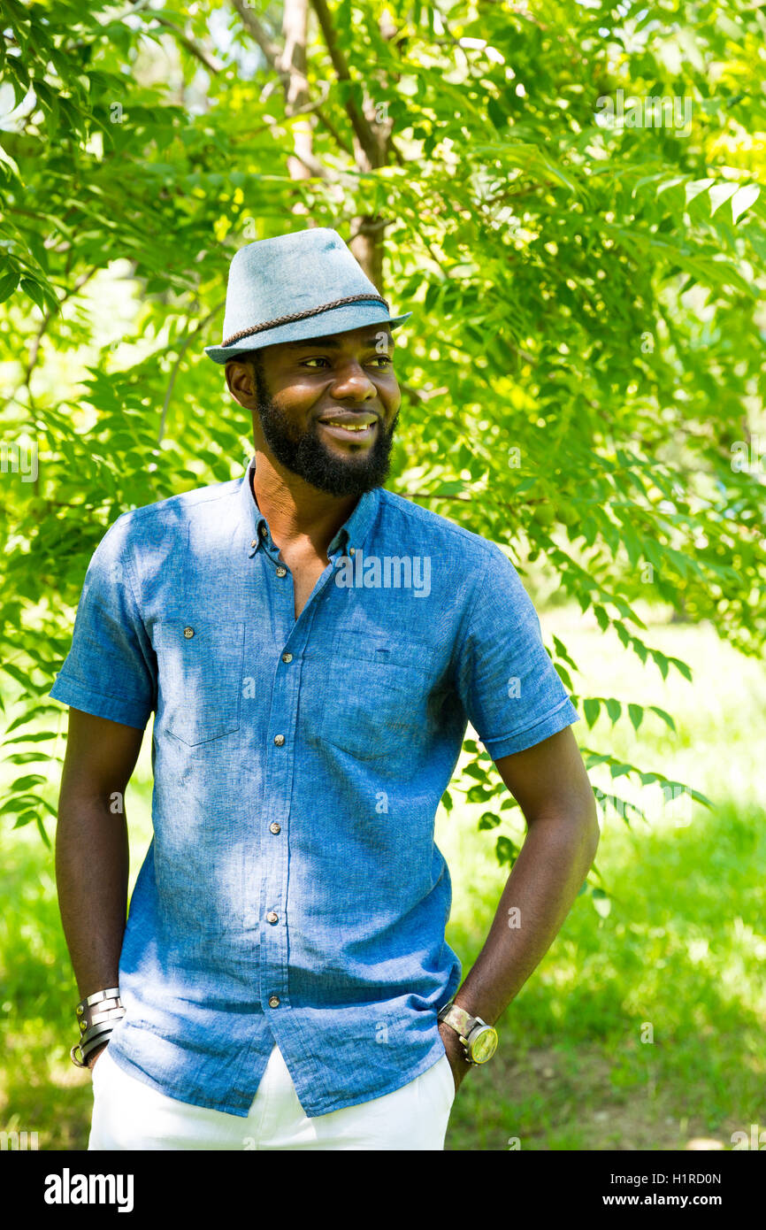 Portrait of African American Cheerful black man smiling on nature Stock ...