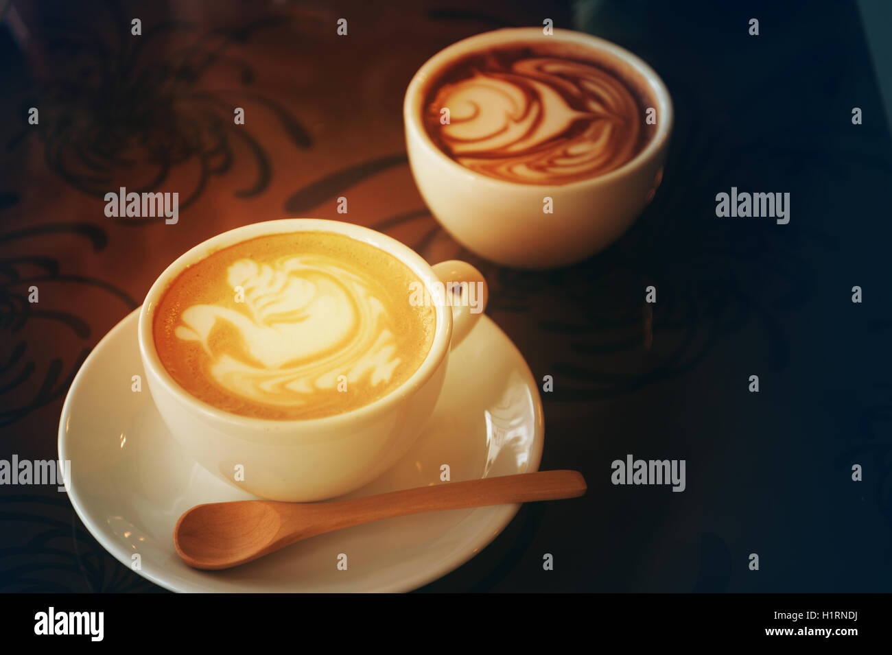 coffee cup, tea pot ,cookies and laptop on wooden desk on cofe ...