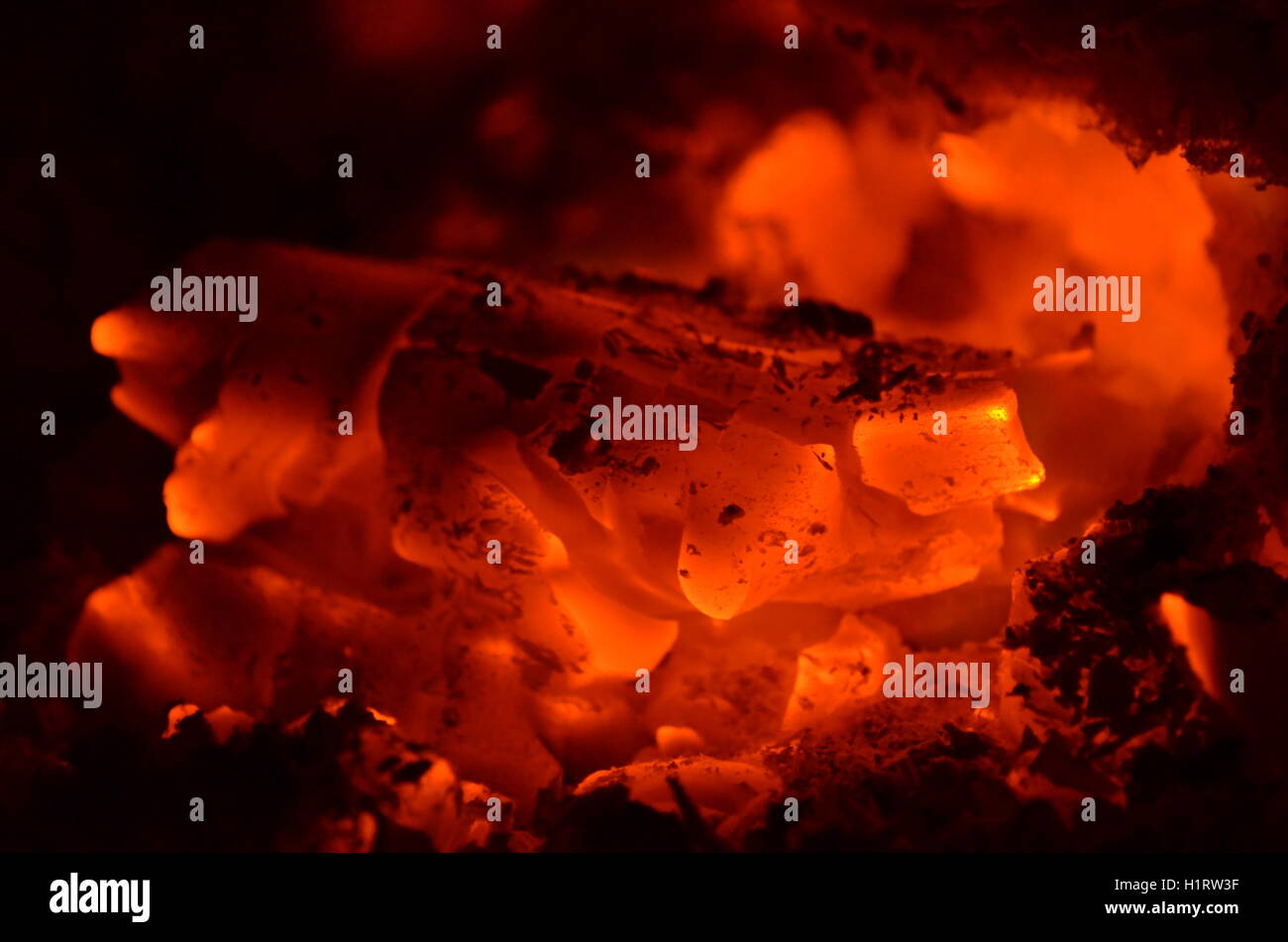 A big burning fire in the fireplace gives off a lot of heat Stock Photo ...
