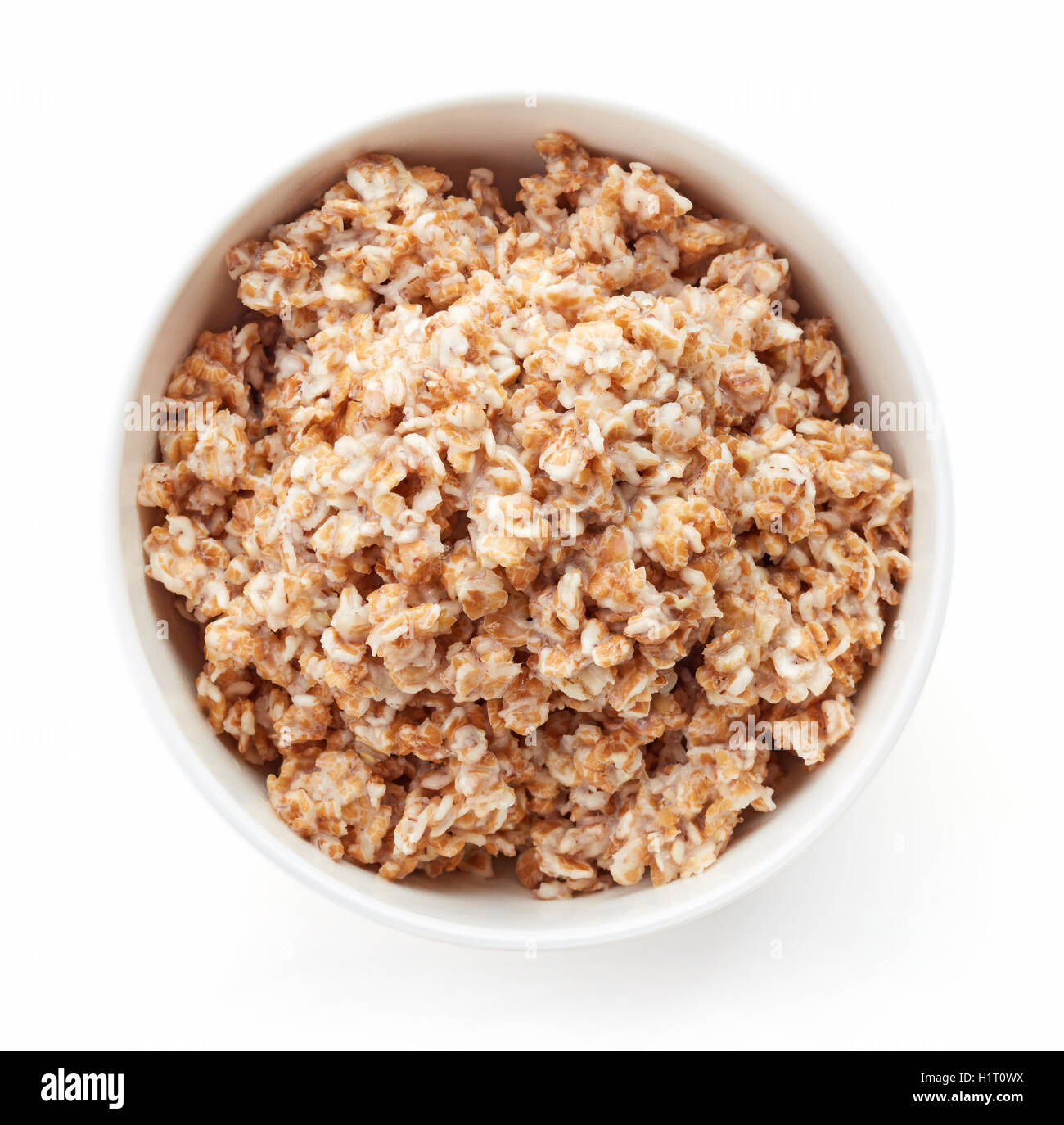 Bowl of rye flake porridge isolated on white background, top view Stock ...