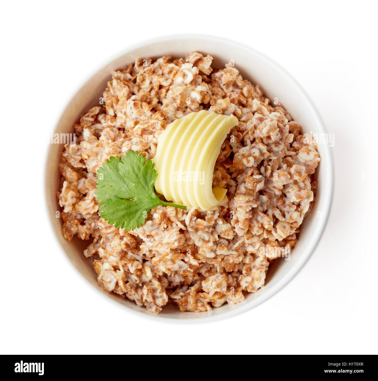 Bowl of rye flake porridge isolated on white background, top view Stock ...