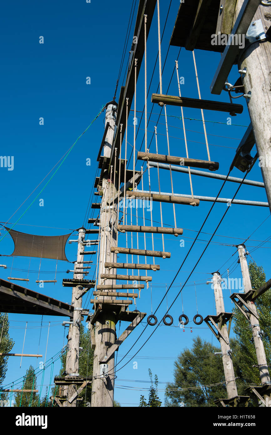 big climbing playground with poles and ropes Stock Photo - Alamy