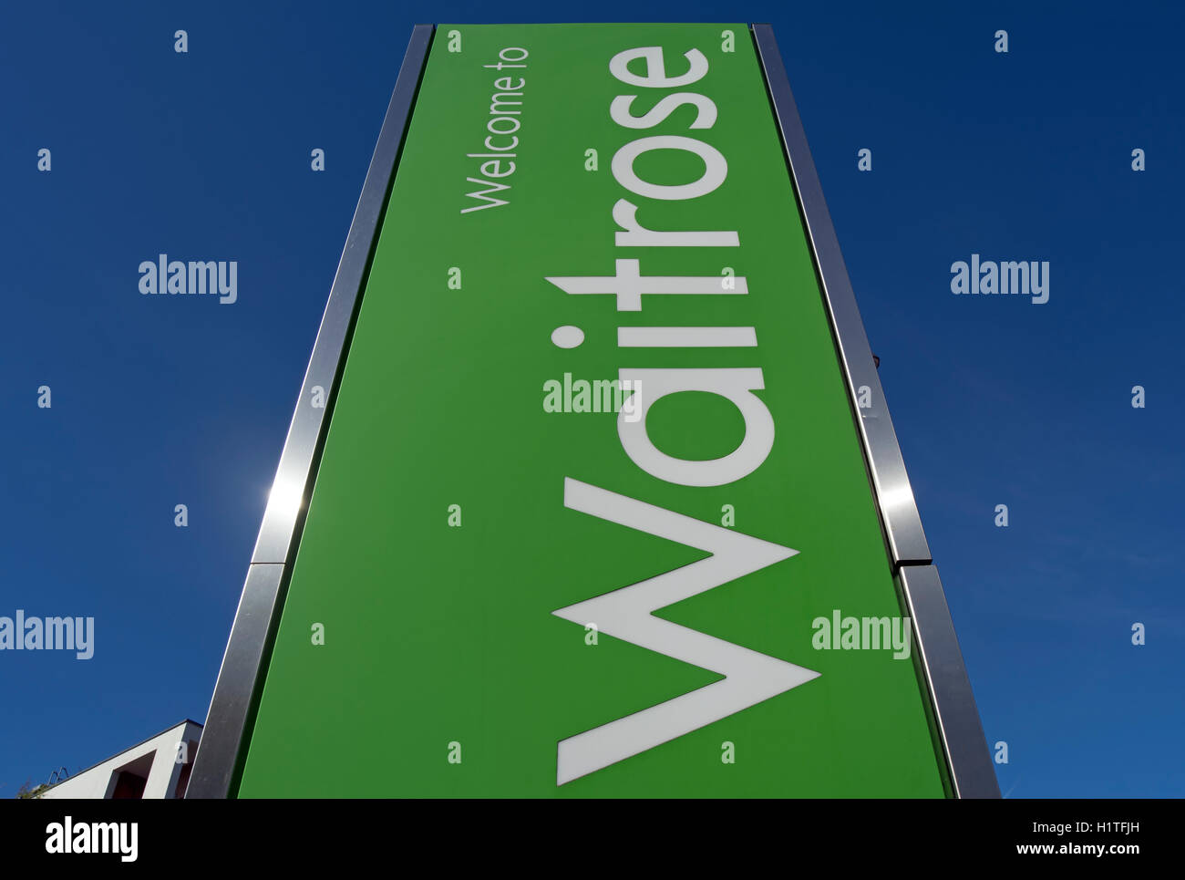 welcome to waitrose pillar sign at a branch of the supermarket chain in ...