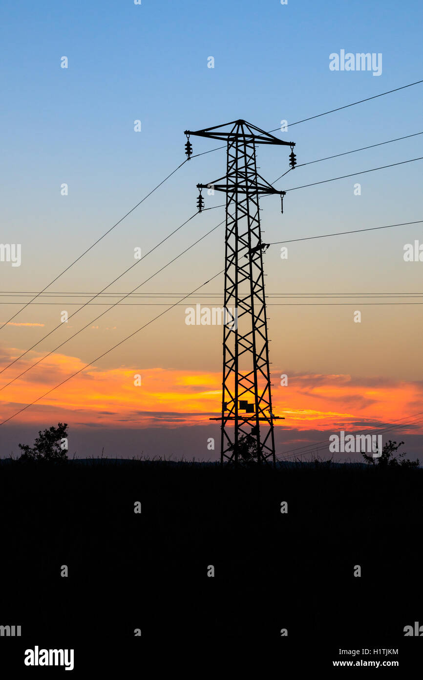 Pylon silhouette at sunset in Yorkshire UK Stock Photo - Alamy