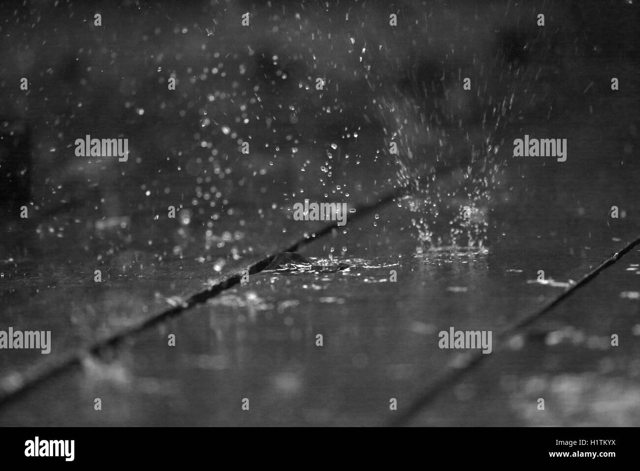 splashing rain on wood planks Stock Photo - Alamy