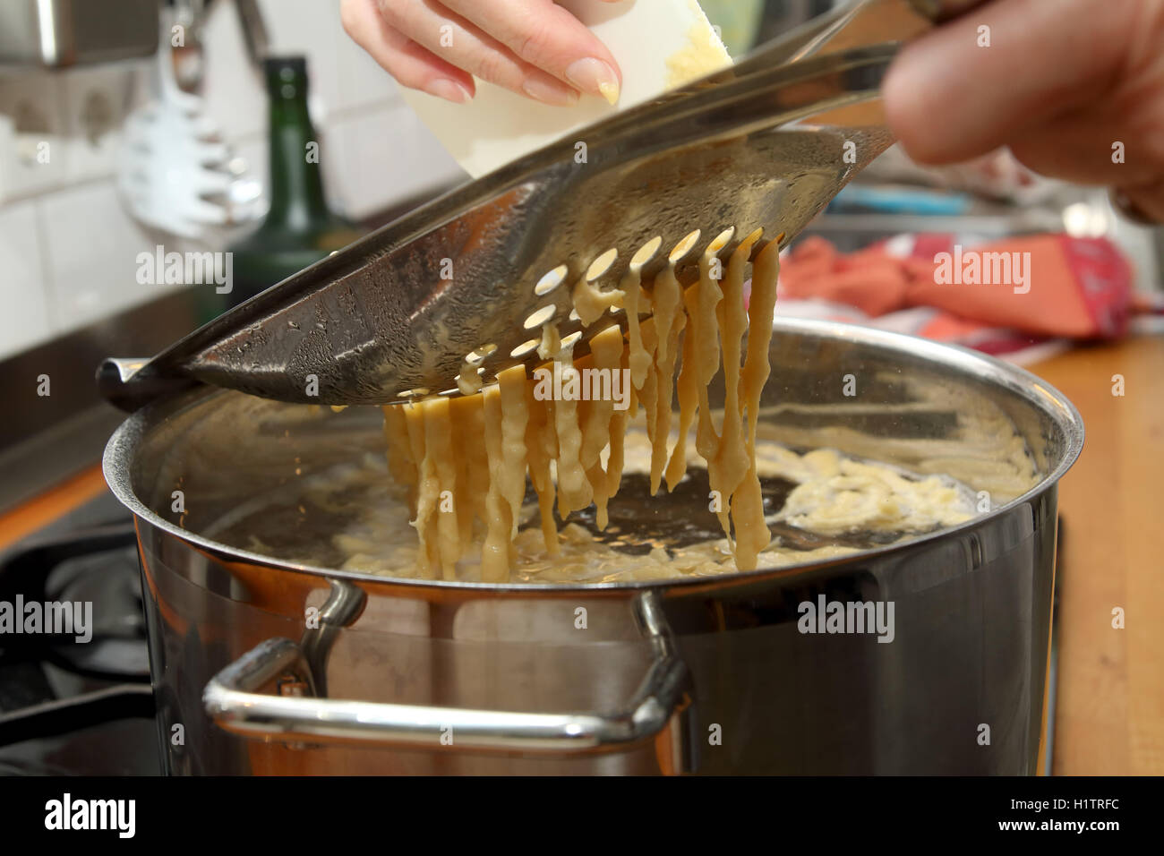 Spaetzle machine hi-res stock photography and images - Alamy