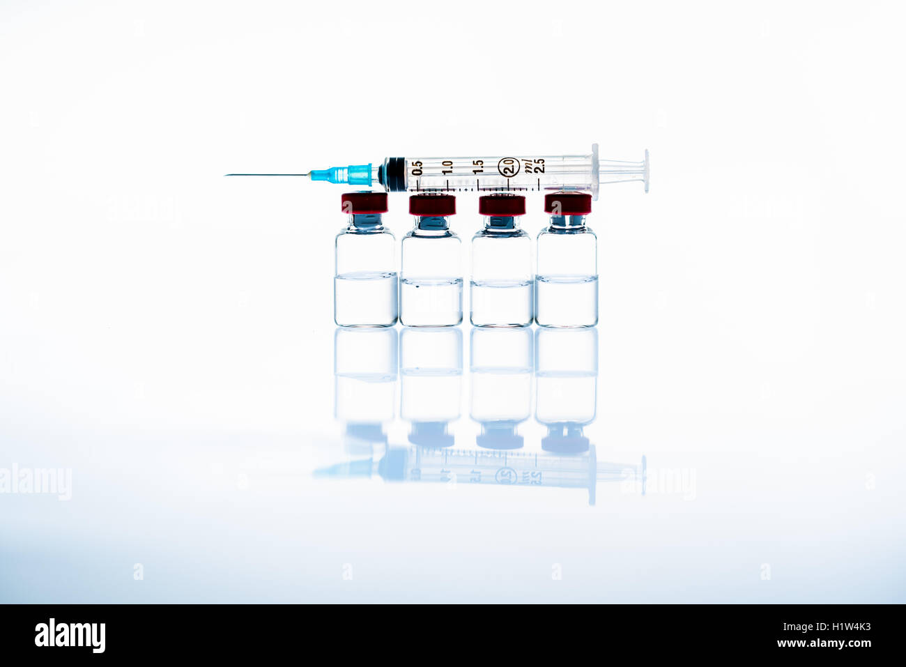 Vials and syringes Stock Photo - Alamy