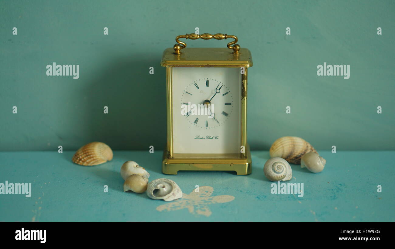Teal clock hi-res stock photography and images - Alamy