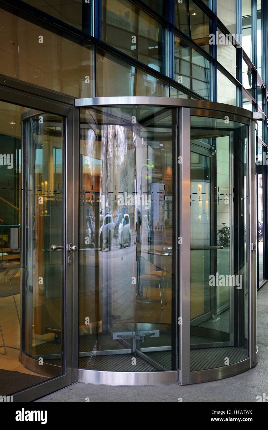 Modern Revolving Door As Entrance To Office Building Or Hotel Stock modern-revolving-door-as-entrance-to-office-building-or-hotel-stock