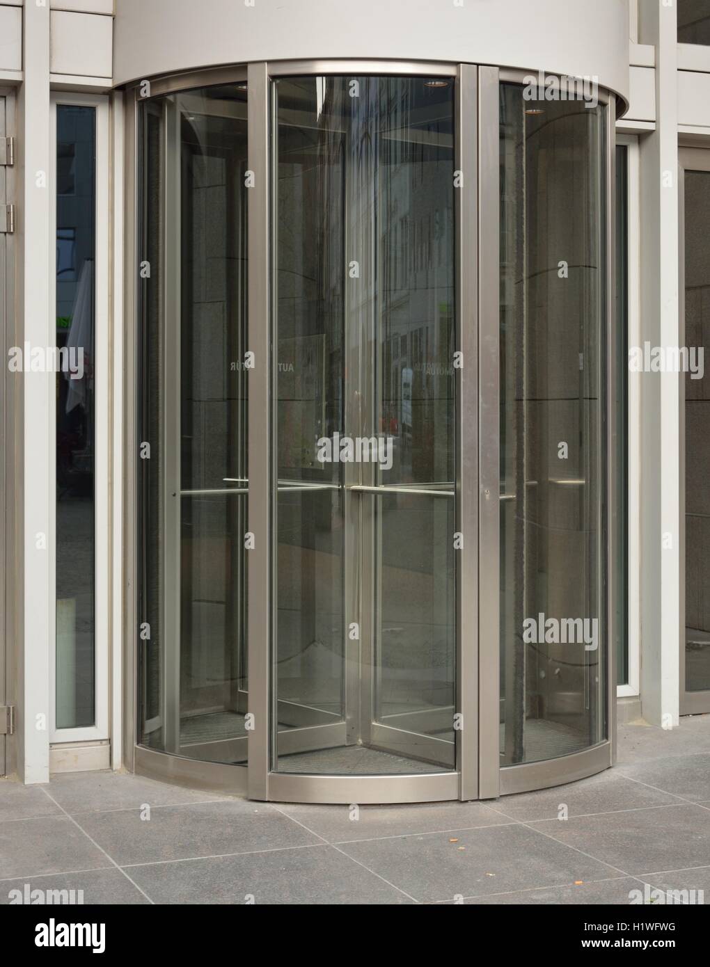 Modern revolving door as entrance to office building or hotel Stock ...