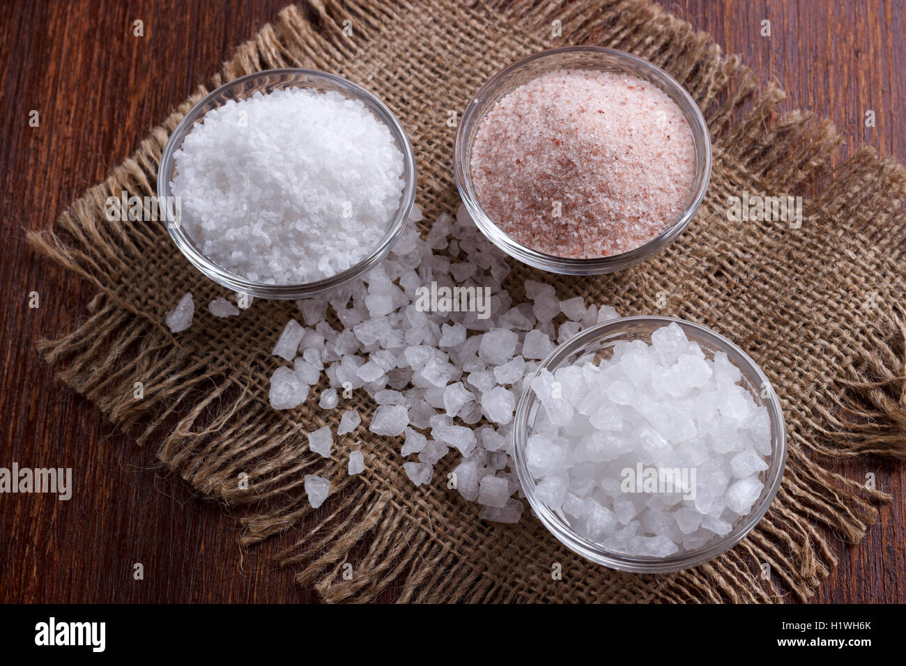 Three types of salt on dark background, selective focus Stock Photo - Alamy