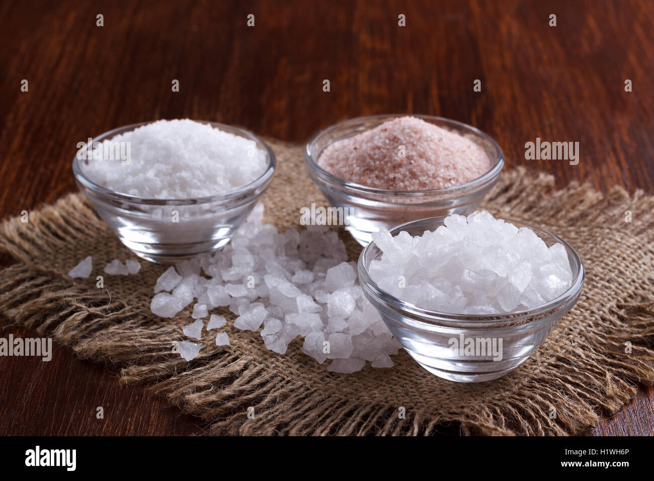 Three types of salt on dark background, selective focus Stock Photo - Alamy