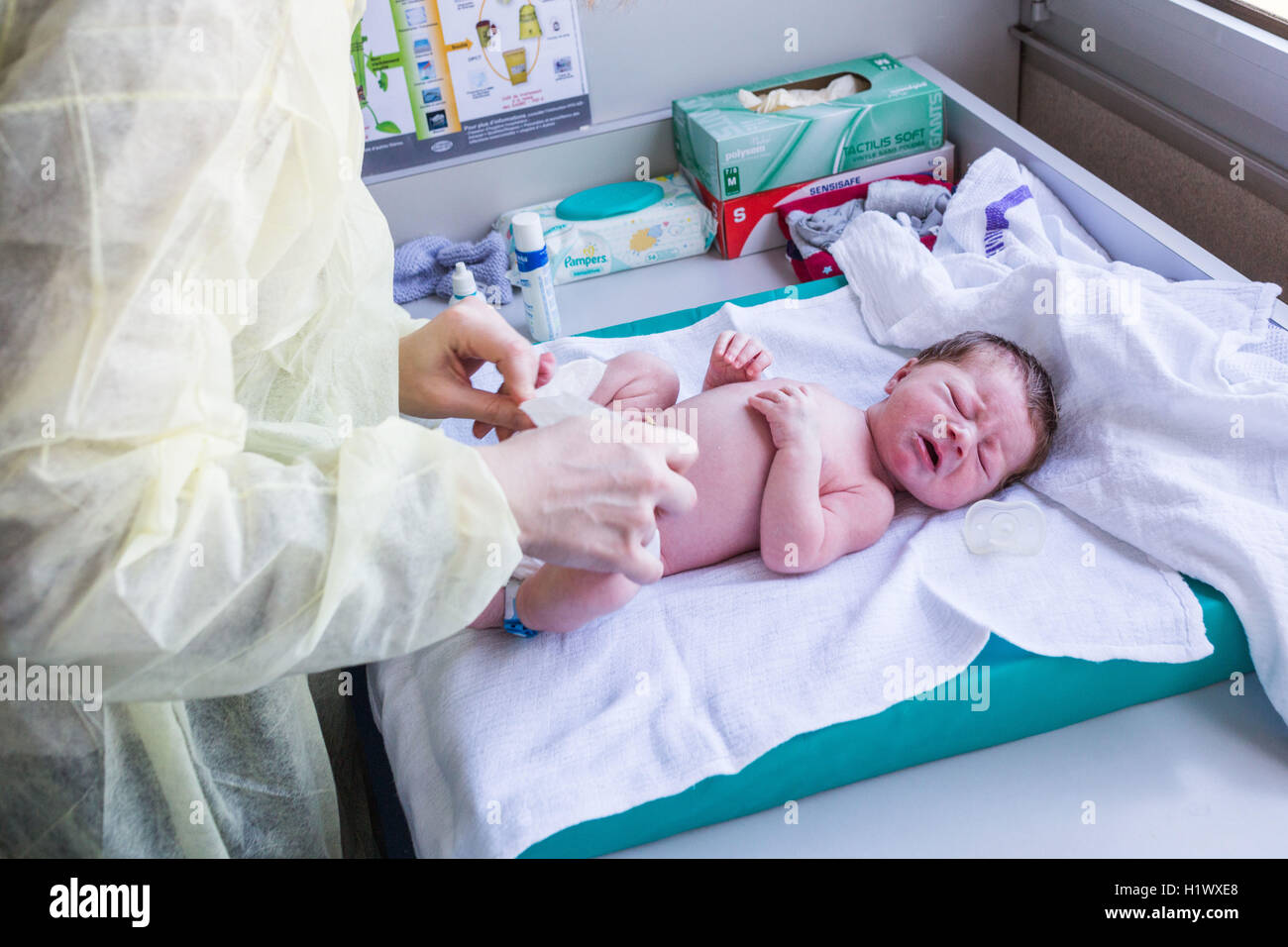 Mother with her newborn baby at a pediatric intensive care unit, CHU ...
