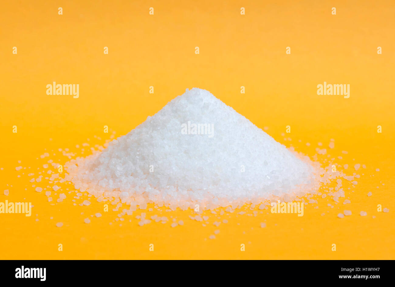 Pile of sugar isolated Stock Photo - Alamy