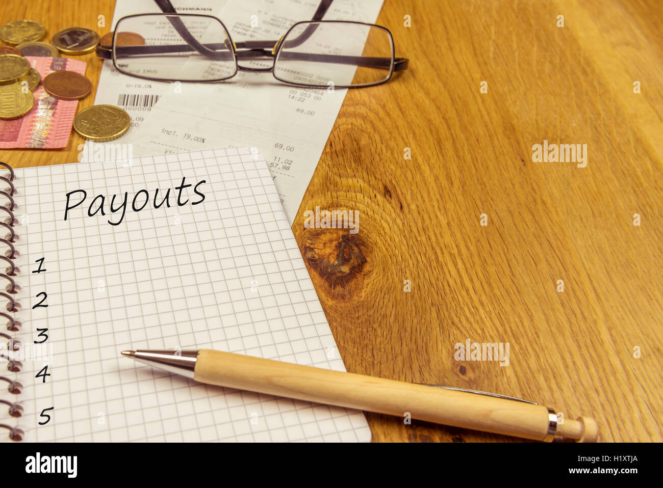 Financial concept with an empty payouts list written in a spiral ...