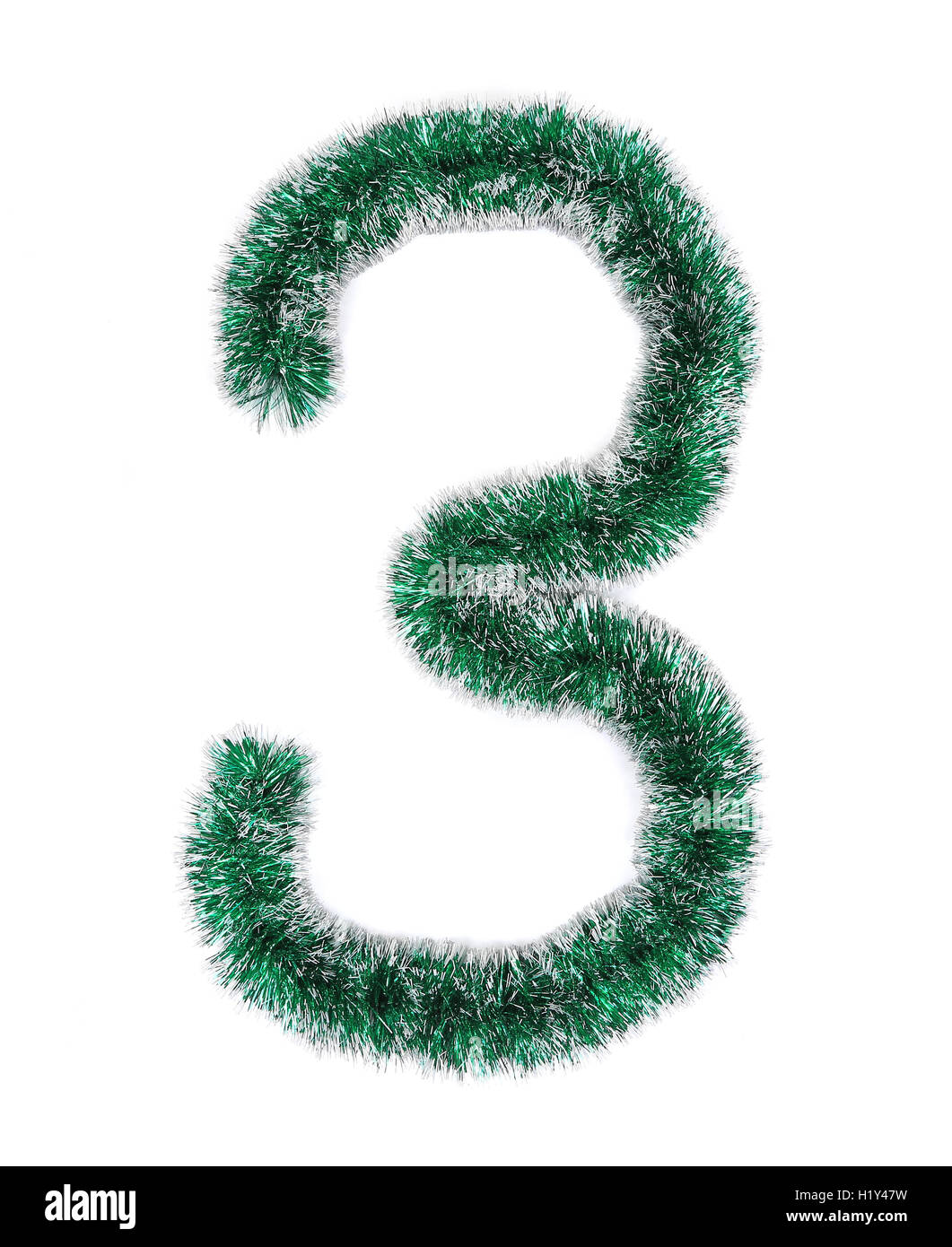 Christmas green tinsel as number 3 Stock Photo - Alamy