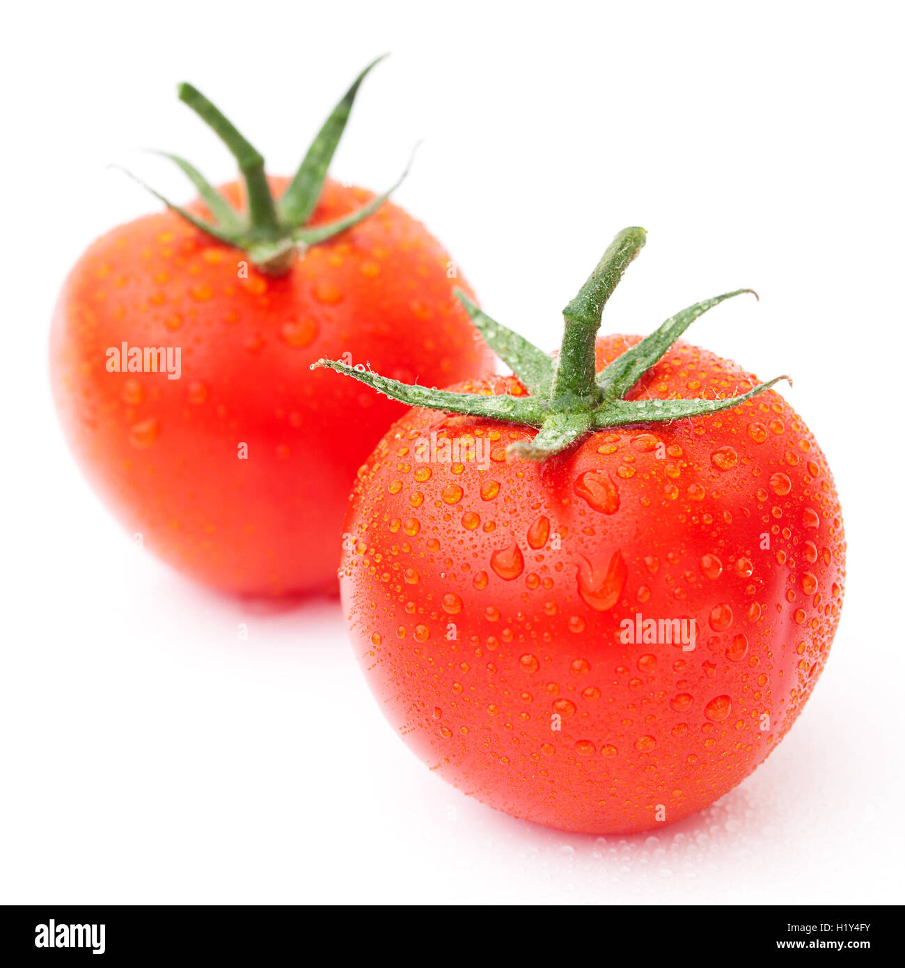 red ripe tomato isolated on white Stock Photo - Alamy