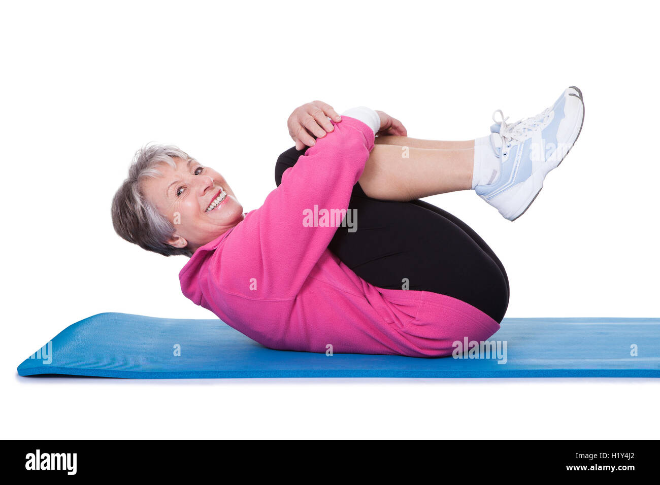 Cheerful senior woman exercise Cut Out Stock Images & Pictures - Alamy