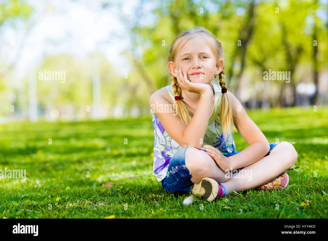 portrait of a girl in a park Stock Photo - Alamy