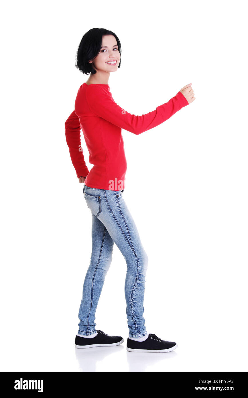 Side view of walking beautiful woman Stock Photo - Alamy