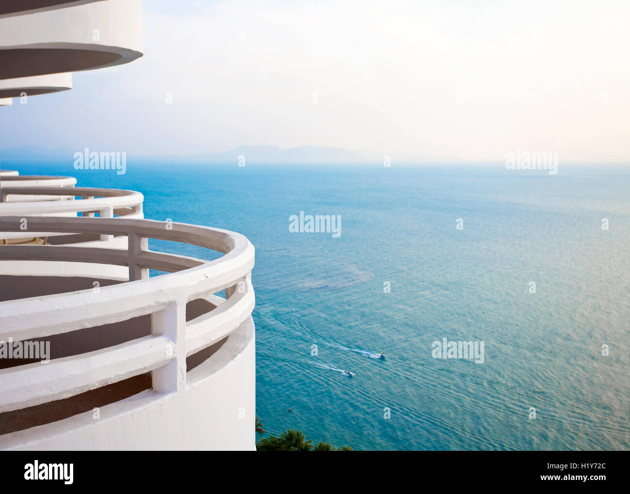 White balcony looking over beautiful blue ocean Stock Photo - Alamy